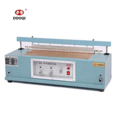 China DUOQI QD-A600 Aluminum Pneumatic Table Sealing Machine for Commodity Packaging Needs for sale