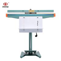 China DUOQI PFS-650x1 Aluminum Frame Foot Pedal Sealing Machine 650mm 1800W for Food Industry for sale