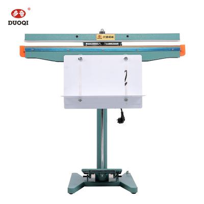 China DUOQI PFS-650x1 Aluminum Frame Foot Pedal Sealing Machine 650mm 1800W for Food Industry for sale