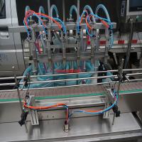 China DUOQI YT6T-6G Pneumatic Liquid Filling Machine 6 Nozzles 8-40 Bottles/Min for Milk Processing for sale