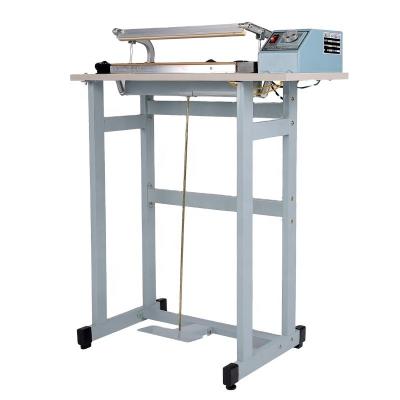 China DUOQI SFP-600 Iron Foot Pedal Heat Sealer 220V 750W Semi-Automatic Bag Sealing Machine for sale
