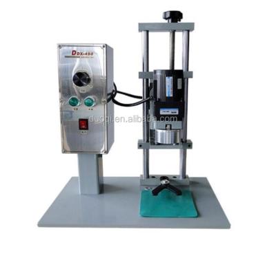 China Semi Automatic Capping Machine DDX-450 200mm Bottle Height 20-40pcs/min for sale