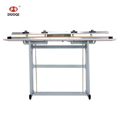 China DUOQI SF-1400 CE Iron Foot Pedal Sealer 930mm Bag Sealing Machine for sale