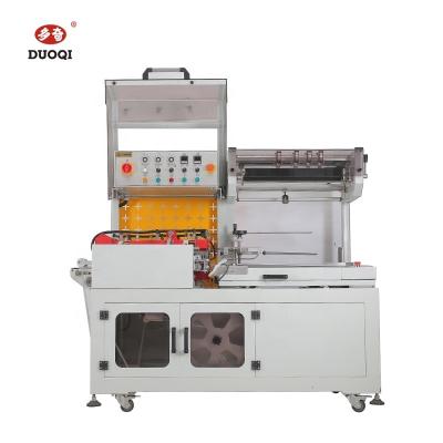 China DUOQI DQL-5545 Heat Shrink Film Packer with 500×400×120mm Packing Size and 25pcs/min Efficiency for sale
