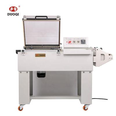 China DUOQI FM5540 2-in-1 Electric Shrink Packaging Machine 550×400×300mm 3.8KW for Bottles Boxes for sale
