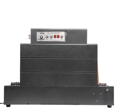 China DUOQI BS-B400*200 Automatic Shrink Wrapping Machine for Machinery Hardware Industry for sale