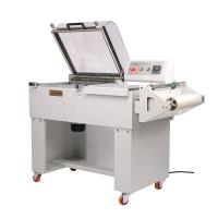 China FM-5540 2-in-1 Shrink Packing Machine 220V 3.8KW for Plastic Packaging for sale