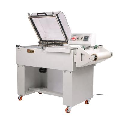 China FM-5540 2-in-1 Shrink Packing Machine 220V 3.8KW for Plastic Packaging for sale