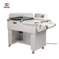 China DUOQI FM5540 2 in 1 Shrink Packaging Machine 1400mm POF Film Sealer and Hand Wrapper 220V 3.8KW for sale