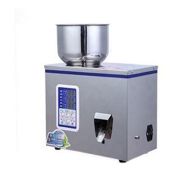 China XKW-20 Semi-Automatic Filling Machine Dispenser for Particle Coffee Powder and Spice 220V 80W for sale