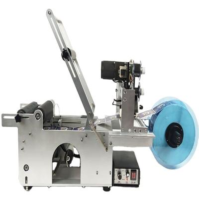 China DUOQI MT-50 Manual Labeling Machine for Round Bottles 10-150mm Diameter with 20-40 pcs/min Speed for sale