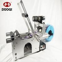 China DUOQI MT-50 Manual Labeling Machine for Round Bottles 10-150mm Diameter with 20-40 pcs/min Speed for sale