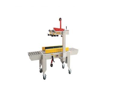 China Semi-Automatic Carton Sealer Machine 220V/50HZ with 1000 Cases/Hour Capacity and 500×500mm Sealing Size for sale