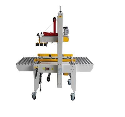 China High Speed Carton Sealing Machine 1000 Cases Per Hour 220V Carton Box Taping Machine for sale