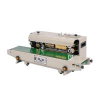China DUOQI FR900 Continuous Table Sealing Shrink Sleeve Seaming Machine 500W 220V for Iron Packaging for sale
