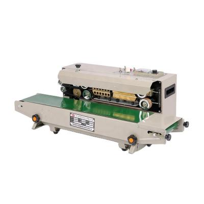 China DUOQI FR900 Continuous Table Sealing Shrink Sleeve Seaming Machine 500W 220V for Iron Packaging for sale