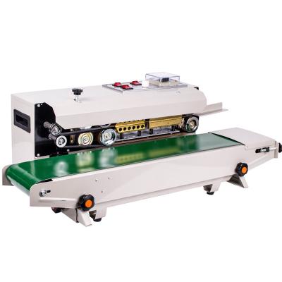 China DUOQI FR900 Horizontal Heat Plastic Bag Sealer 500W 0-12m/min Automatic Packaging Machine for sale