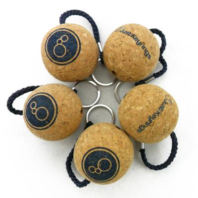 China Custom Logo 50mm Cork Ball Floating Key Chain with Navy Rope for Promotional Gifts for sale