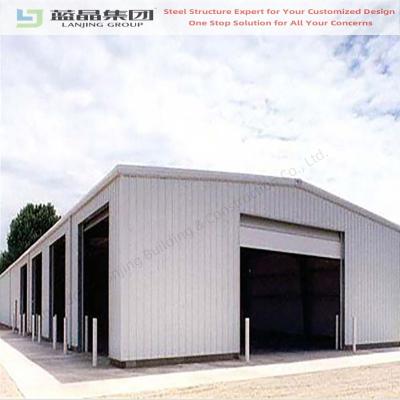 China Prefabricated Customized Steel Metal Workshop Warehouse Construction Building With Steel Sheet Roof Cladding for sale