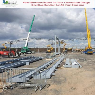 China Large-Span Fire-Resistant Steel Structure Workshop With Steel Sheet And Sandwich Panel Roof Cladding for sale