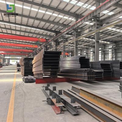 China Prefabricated Materials Warehouse Steel Structure Building With Portal Frame And Gutter Option for sale