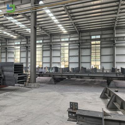 China Modern Prefabricated Metal Frame Construction School Big Industrial Building Shed And Customizable With Gutter Option for sale