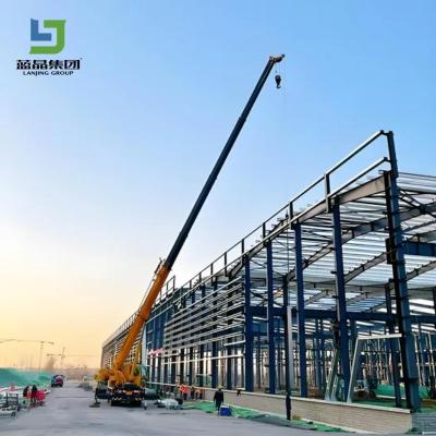 China Prefabricated Steel Frame Construction Steel Barn Industrial Sheds Warehouses for sale