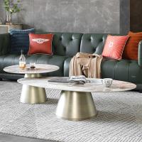 China Impermeable Marble Texture Ellipse Coffee Table For Living Room 360 Degree Rotatable for sale
