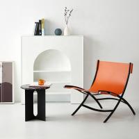 China Minimalist Leather Leisure Chairs Orange Saddle Leather Lounge Chair for sale