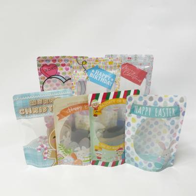 China Food Grade Plastic Gift Packaging Bags Custom Printed Stand Up Zipper Pouch Resealable Snack Packaging Bag with Window for sale