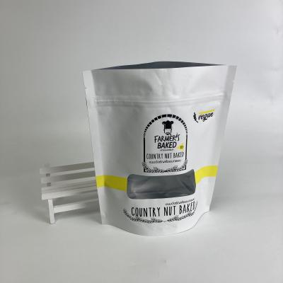 China Custom Printed Kraft Paper Stand Up Zipper Bags for Food Matt Finish Resealable Food Packaging Bags with Window for sale