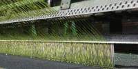 China Premium 11000 Pile Dtex Football Artificial Grass with UV Resistance and Perforation Drainage Holes for sale