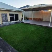 China Environmental Protection  40mm C Shape Landscape Green Artificial Fake Turf  With Drainage Holes for sale