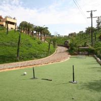 China 48mm Leisure Landscape Artificial Green Fake Turf High Density High Dtex Low Maintenance realistic Appearance for sale