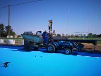 China FIH Certified Hockey Artificial Turf with 14mm Pile Height and Water Spray for Consistent Play for sale