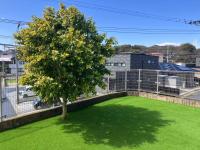 China 30mm Pile Height High Density Synthetic Grass with SBR Latex Backing for Landscaping and Gardens for sale