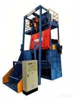 China Two Blast Wheels Tumble Drum Shot Blasting Machine With Rubber Belt Apron For Batch Cleaning for sale