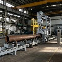 China Steel Pipe Shot Blasting Machine with customizable settings for various pipe diameters and lengths improving productivity for sale