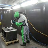 China Safe Sand Blasting Room with Automated Control Panel, High-Quality Steel Structure, and Floor Scraper System for sale