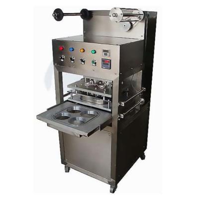 China Stainless Steel Automatic Packing Machine Plastic Cup Sealing Machine 2KW 0.8Mpa 400trays/hour for sale