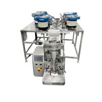 China Vibration Disk Vertical Packaging Machine 260mm Film Width 220V 50Hz for Screws Nuts Fasteners for sale