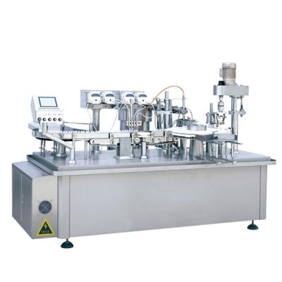 China Vacuum Small Bottle 500ml 1.2kw Liquid Filling Machine for sale
