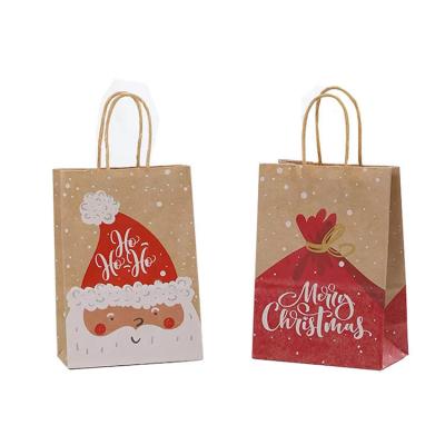 China Christmas Paper Gift Bags Reusable Kraft Paper Shopping Bags Logo Printed for sale