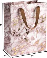 China Customized Hot Stamping Kraft Paper Bag with Carry Handles and Recyclable Material for sale