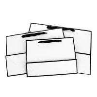 China Custom Printing Paper Gift Bags White Cardboard Shopping Bag For Shoes Clothing for sale