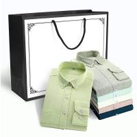 China Recyclable Kraft Paper Gift Bags For Women'S Luxury Clothes Retail Store Packaging for sale