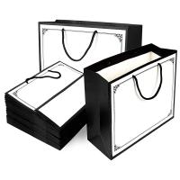 China Recyclable Kraft Paper Gift Bags For Women'S Luxury Clothes Retail Store Packaging for sale
