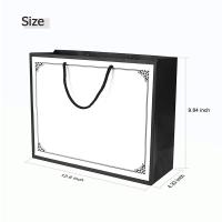 China Recyclable Kraft Paper Gift Bags For Women'S Luxury Clothes Retail Store Packaging for sale