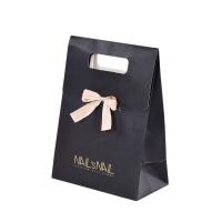 China Luxury Paper Gift Bags Packaging With Die Cut Handle And Logo for sale
