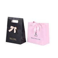 China Luxury Paper Gift Bags Packaging With Die Cut Handle And Logo for sale